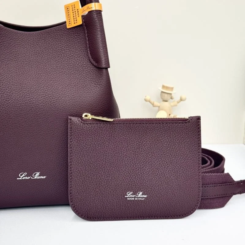 Indistinguishable Loro Piana Bucket Bags