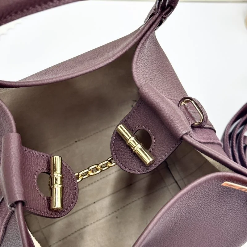 Indistinguishable Loro Piana Bucket Bags