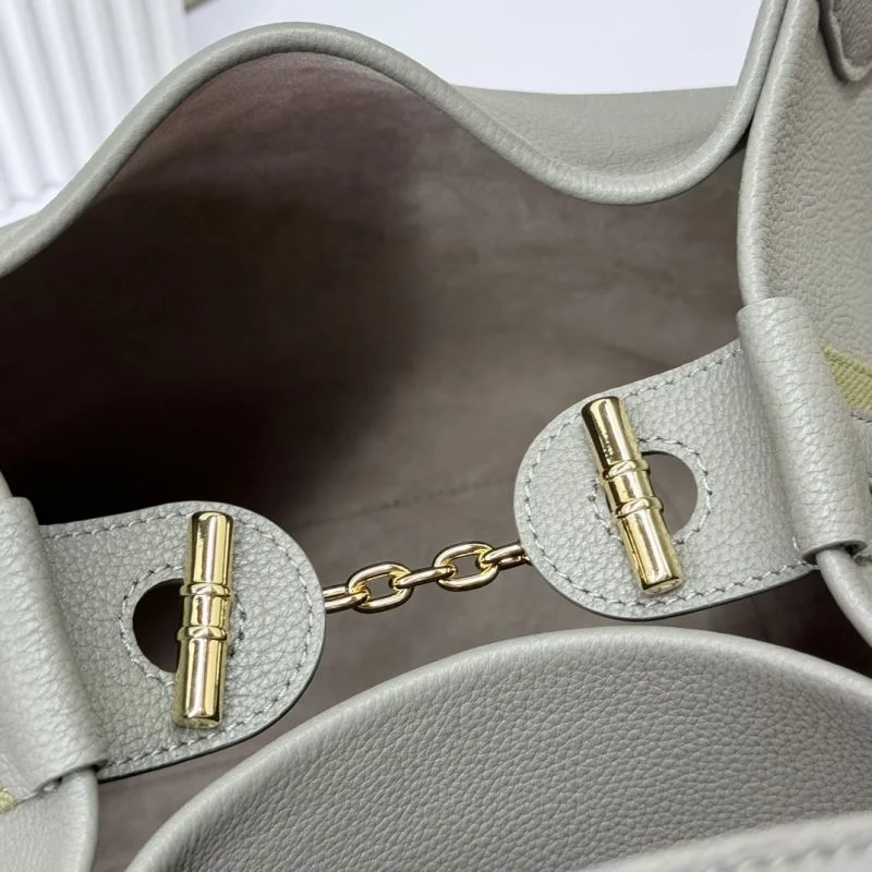 Indistinguishable Loro Piana Bucket Bags