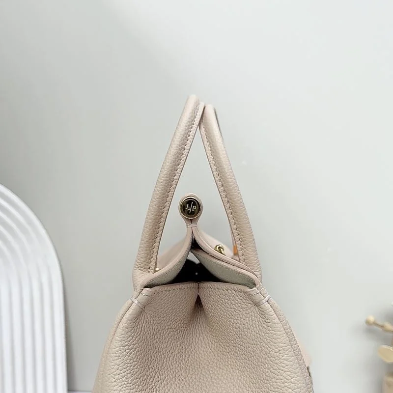 Value-priced Loro Piana Top Handle Bags
