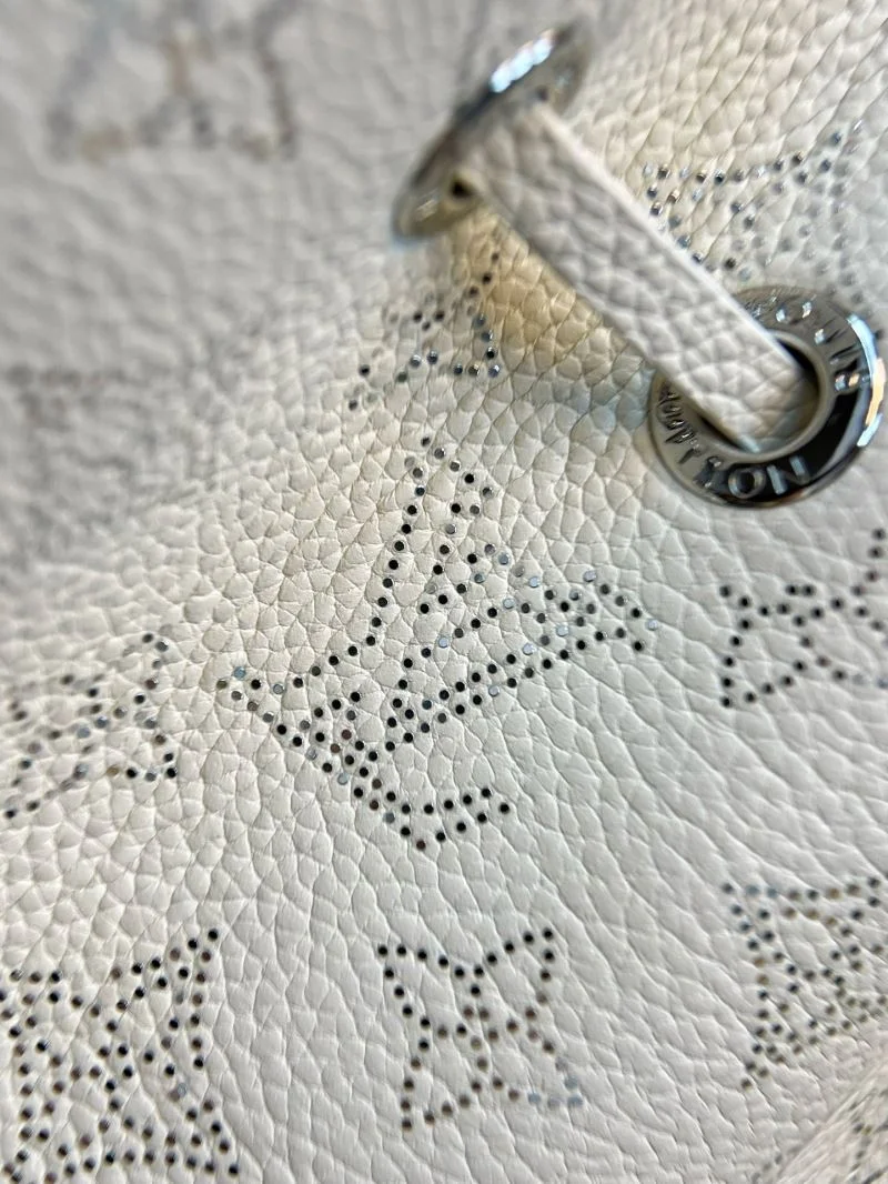 Indistinguishable Louis Vuitton Bucket Bags