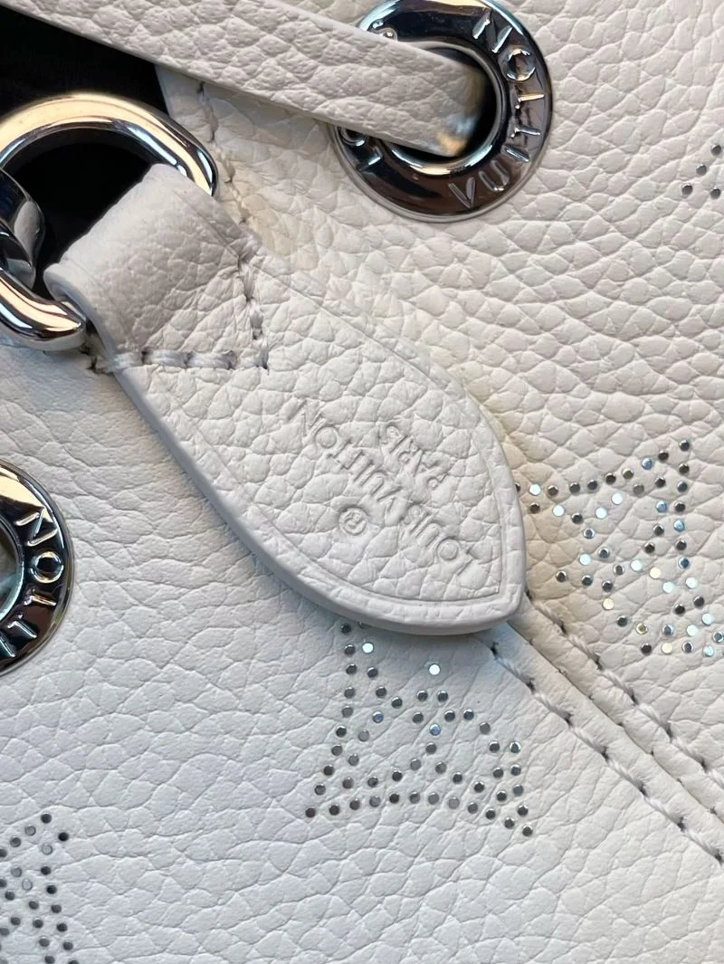 Indistinguishable Louis Vuitton Bucket Bags