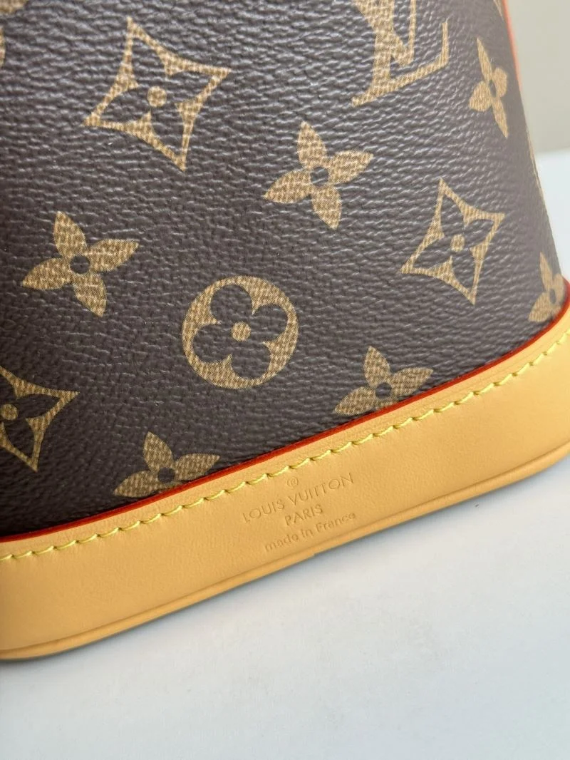 Indistinguishable Louis Vuitton Bucket Bags