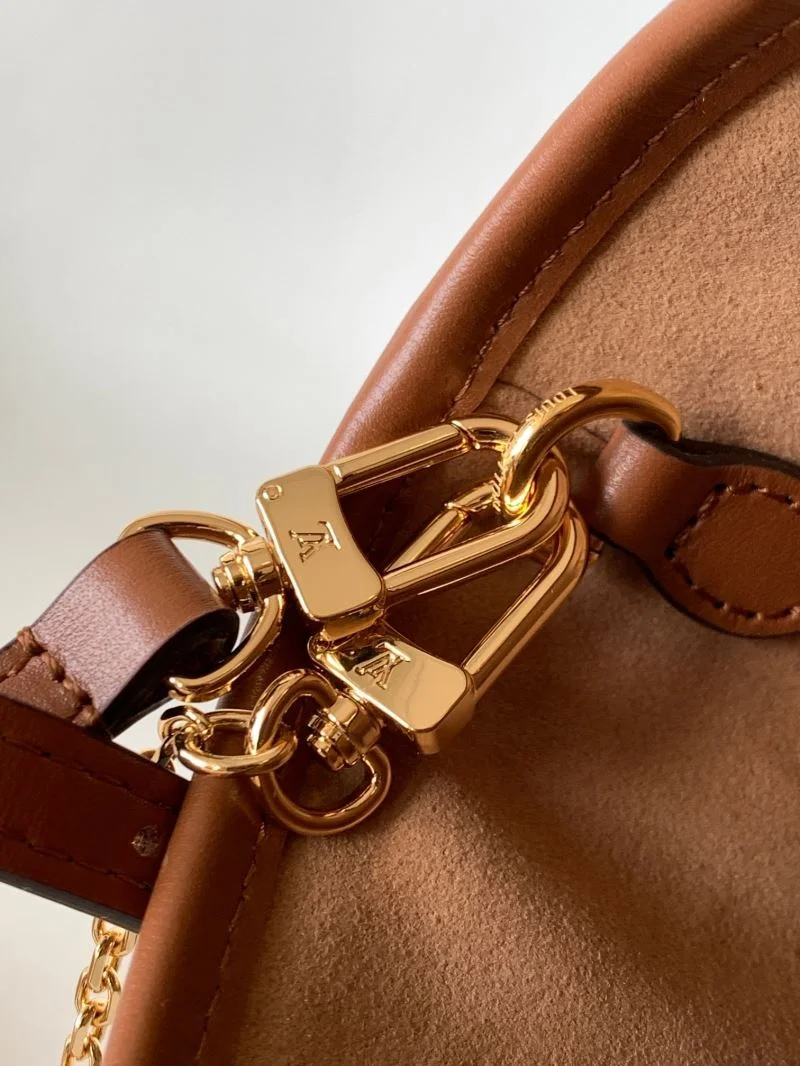 Indistinguishable Louis Vuitton Bucket Bags