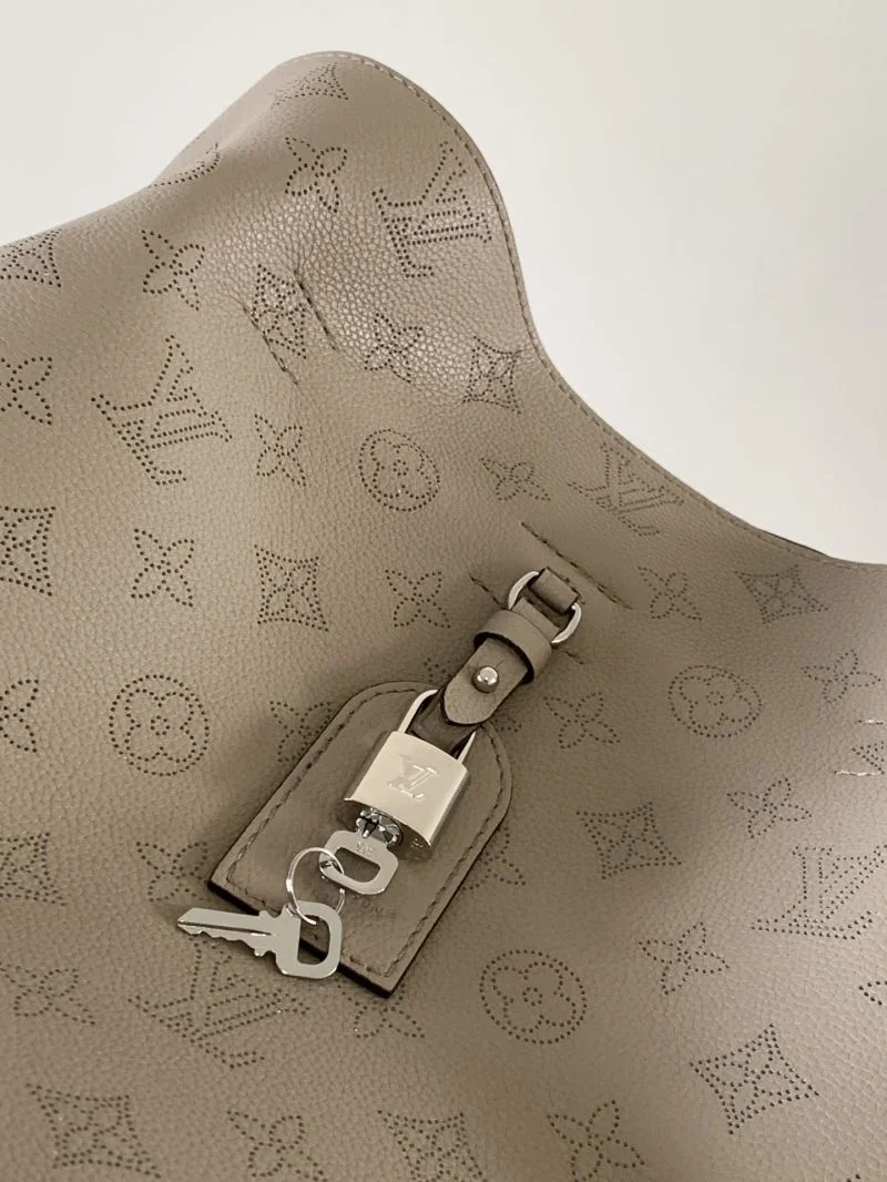 Indistinguishable Louis Vuitton Bucket Bags