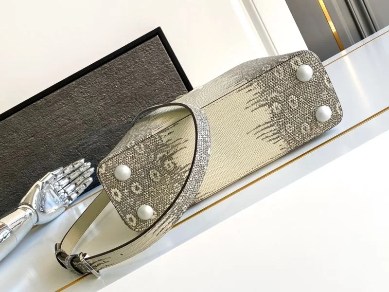 Brand-authenticated Louis Vuitton Capucines BB Bags