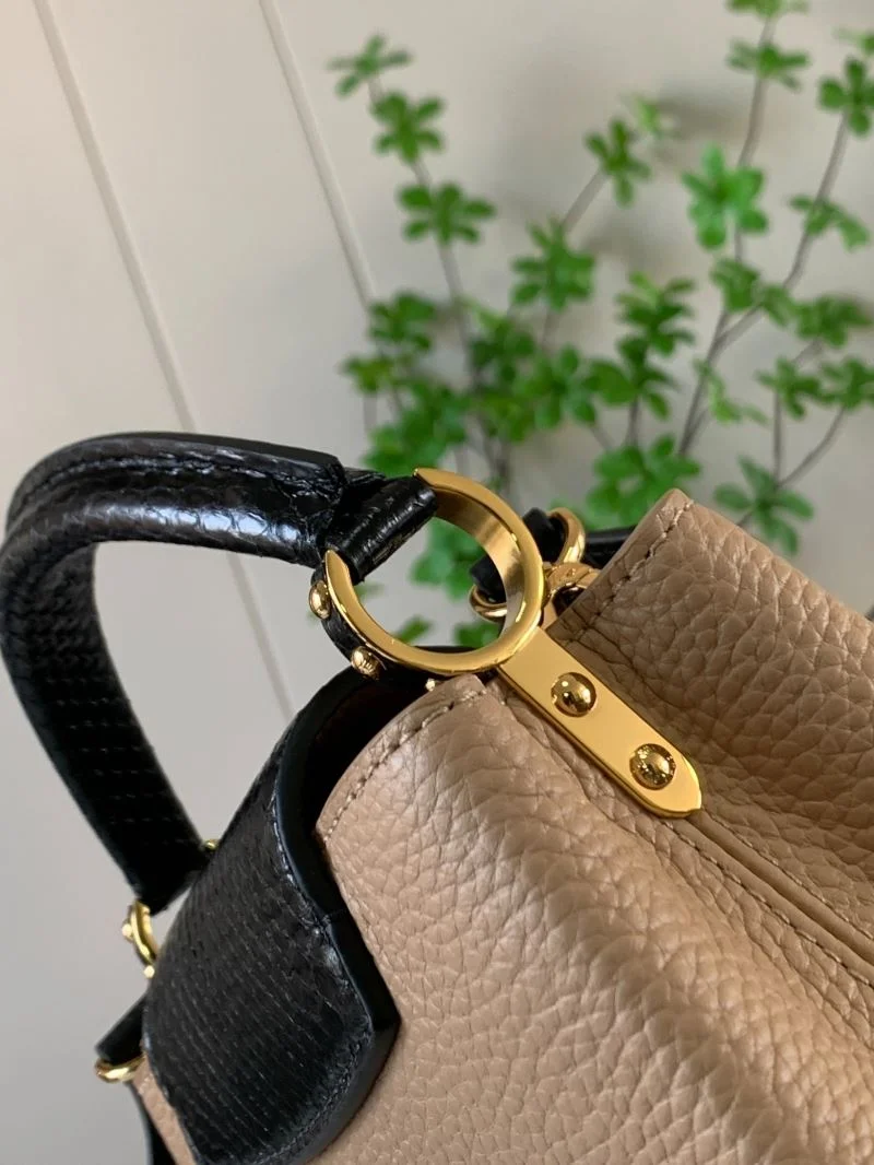 Brand-authenticated Louis Vuitton Capucines BB Bags