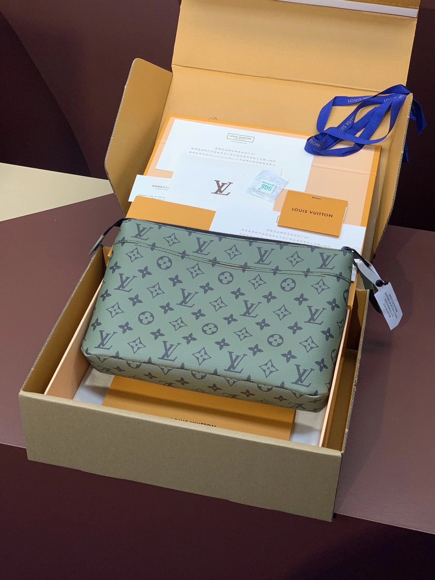 Indistinguishable Louis Vuitton Clutch Bags