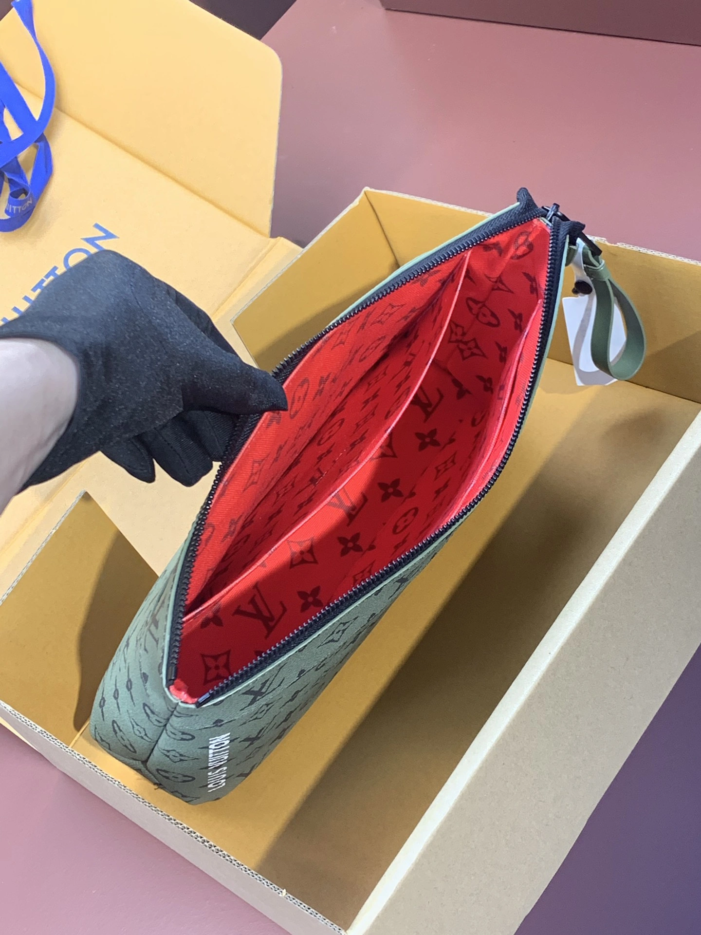 Indistinguishable Louis Vuitton Clutch Bags