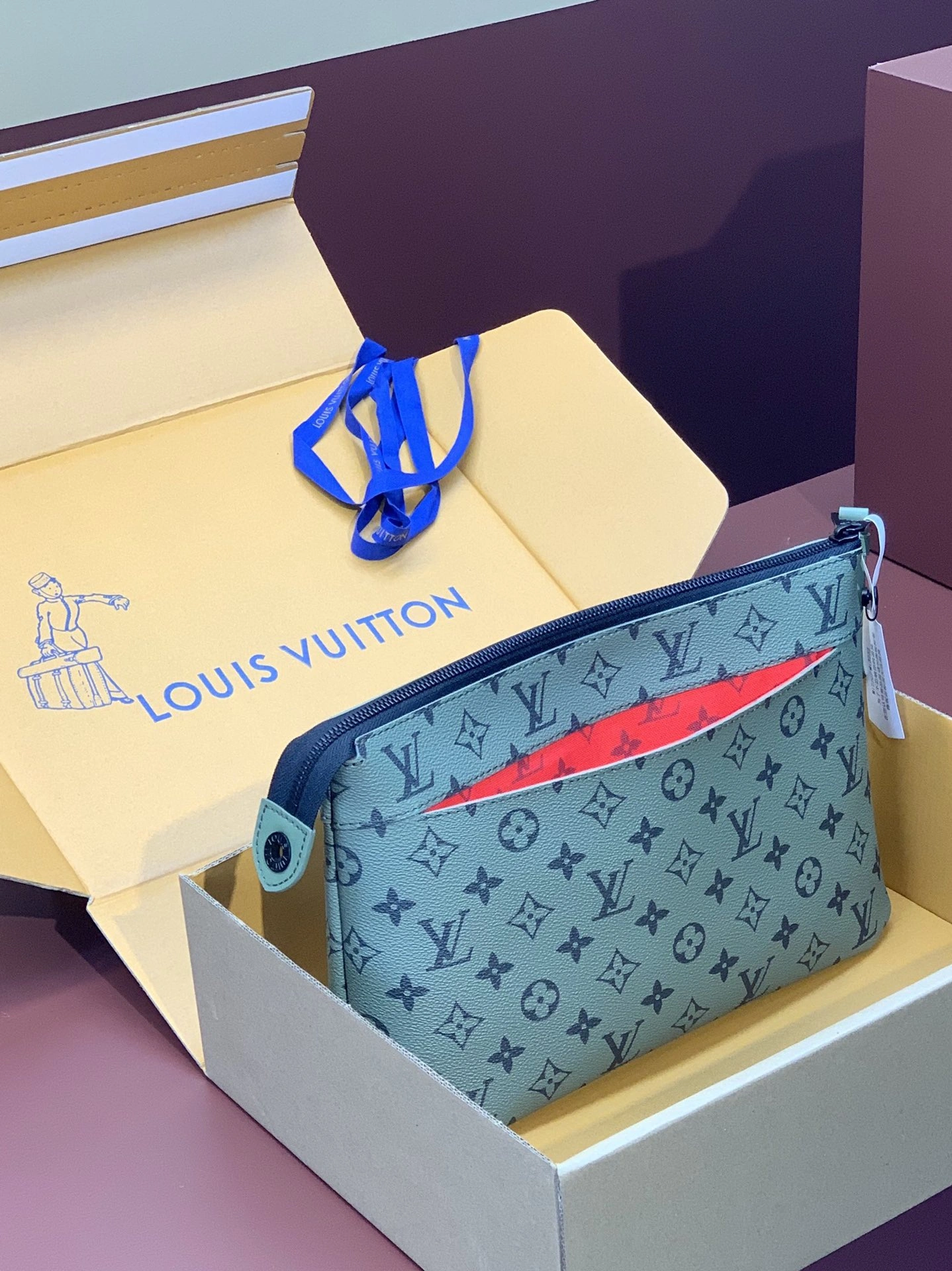 Indistinguishable Louis Vuitton Clutch Bags