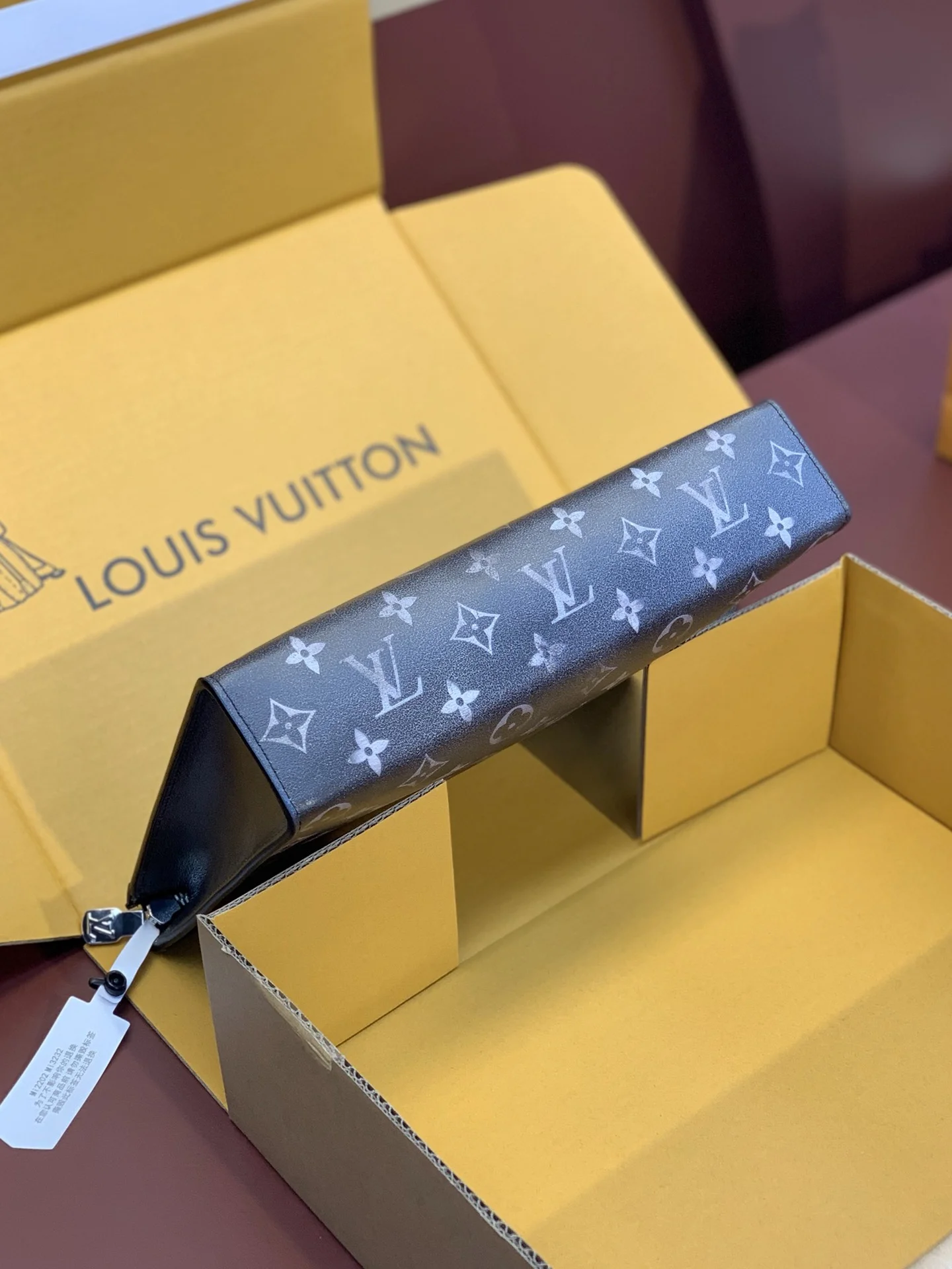 Brand-authenticated Louis Vuitton Clutch Bags
