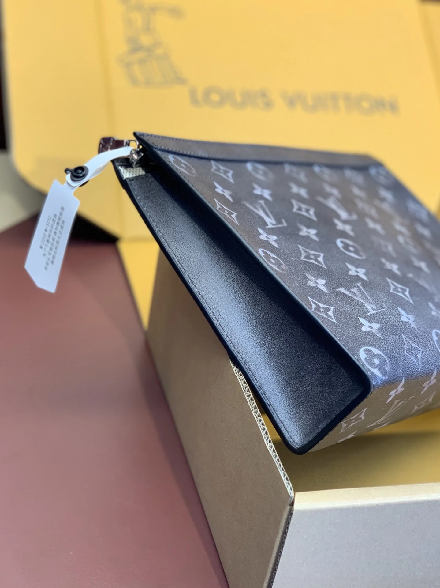 Brand-authenticated Louis Vuitton Clutch Bags