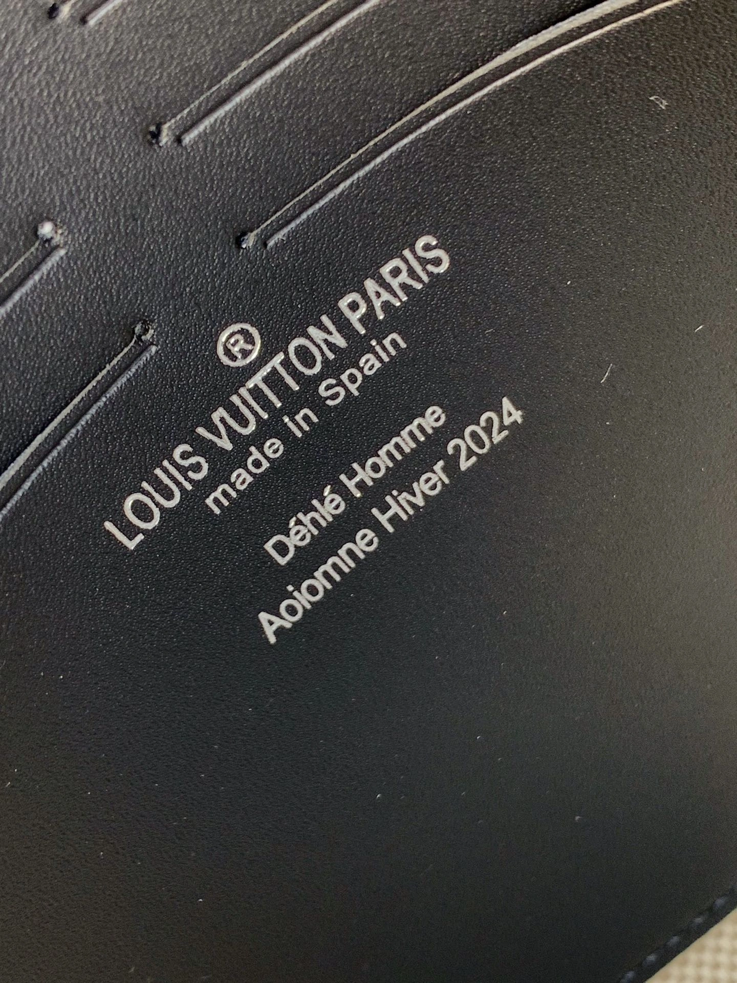 Brand-authenticated Louis Vuitton Clutch Bags