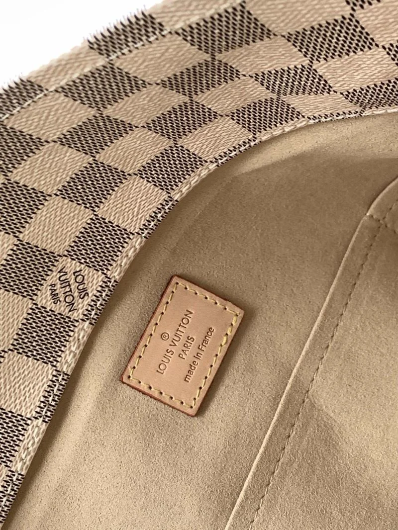 Brand-authenticated Louis Vuitton Shopping Bags