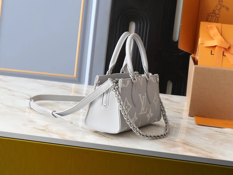 Brand-authenticated Louis Vuitton Shopping Bags