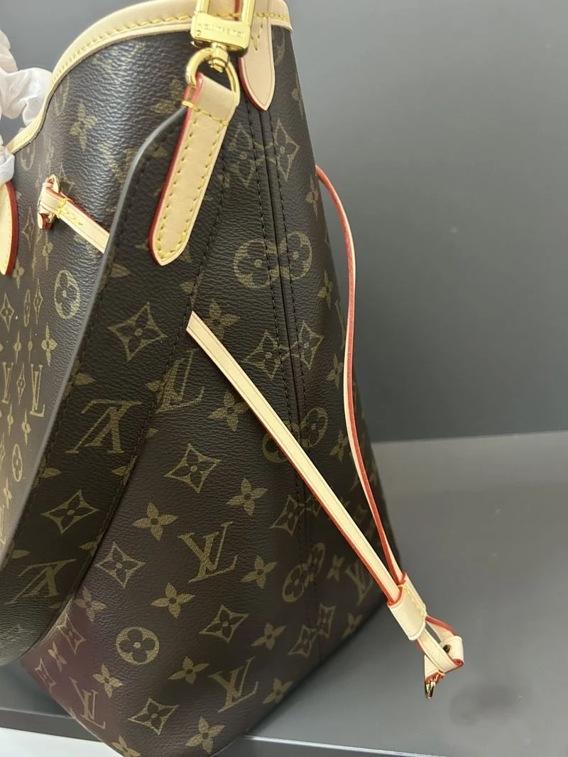 Brand-authenticated Louis Vuitton Shopping Bags