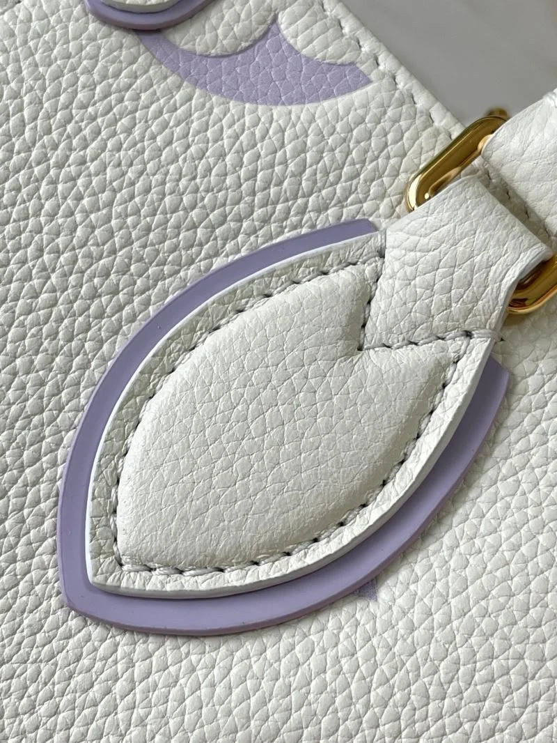 Brand-authenticated Louis Vuitton Shopping Bags