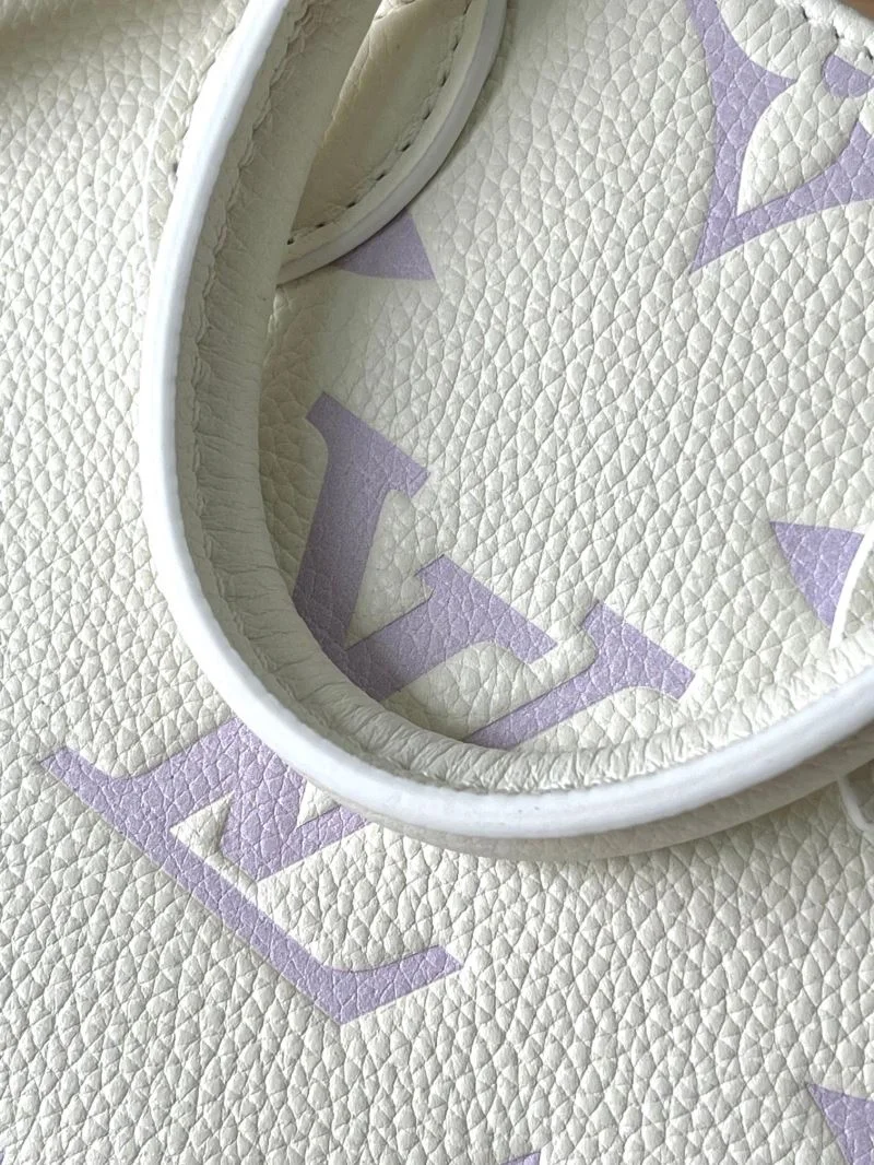 Brand-authenticated Louis Vuitton Shopping Bags