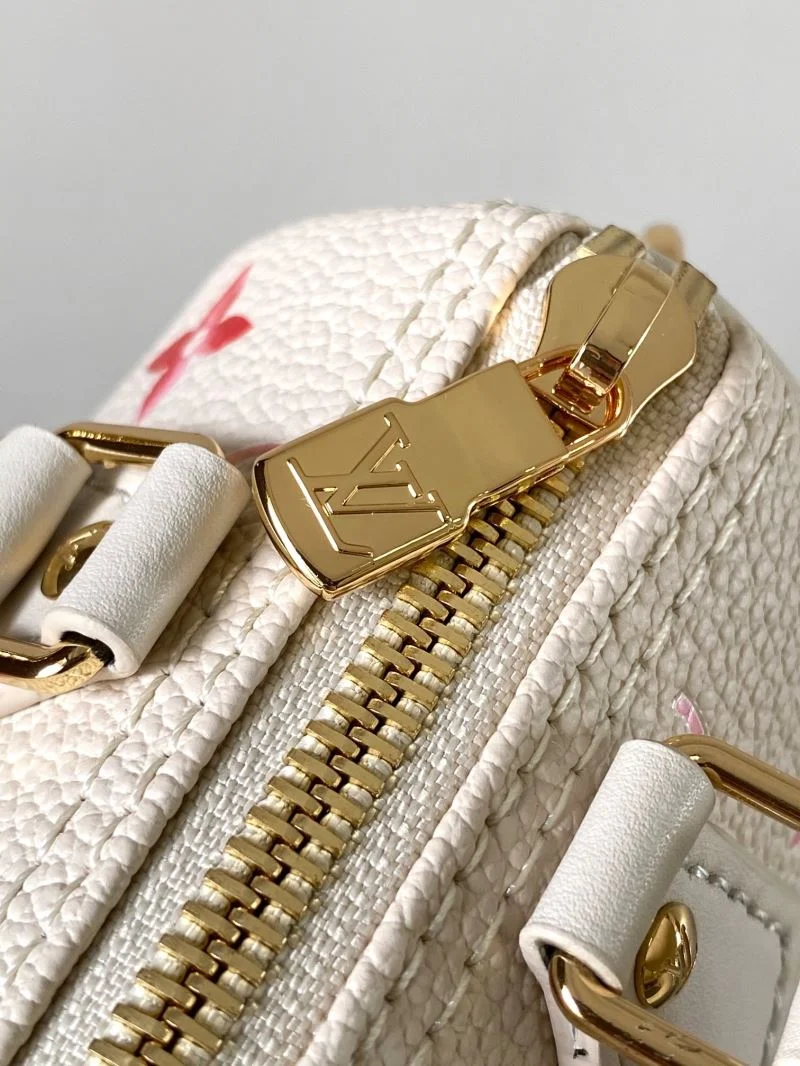 Brand-authenticated Louis Vuitton Speedy Bags