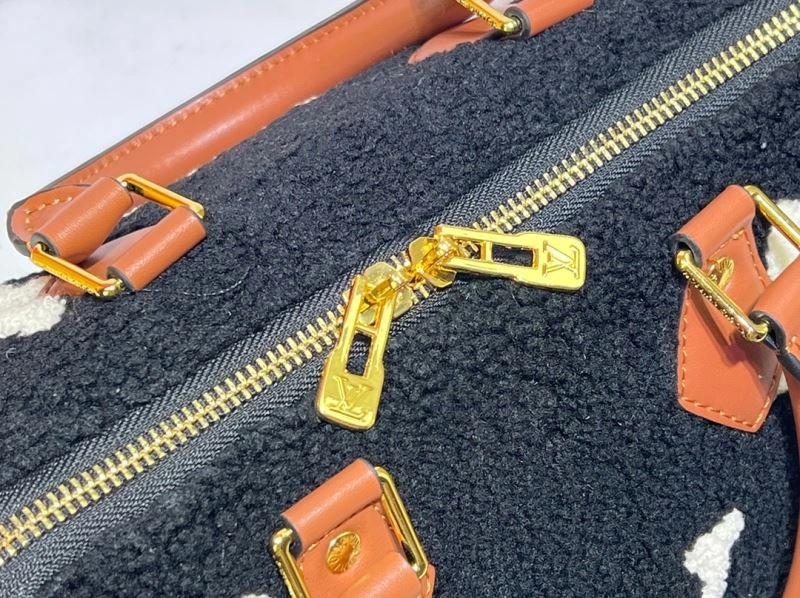 Brand-authenticated Louis Vuitton Speedy Bags