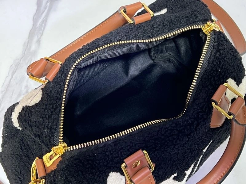 Brand-authenticated Louis Vuitton Speedy Bags