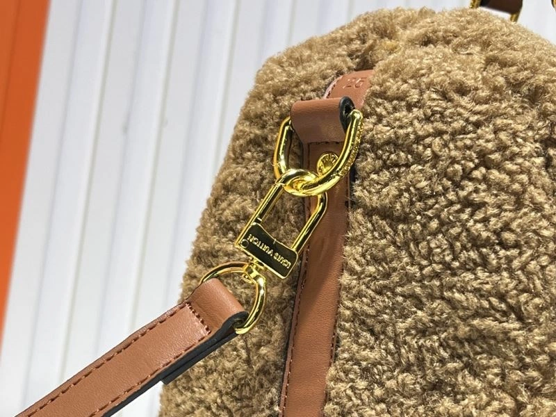 Brand-authenticated Louis Vuitton Speedy Bags