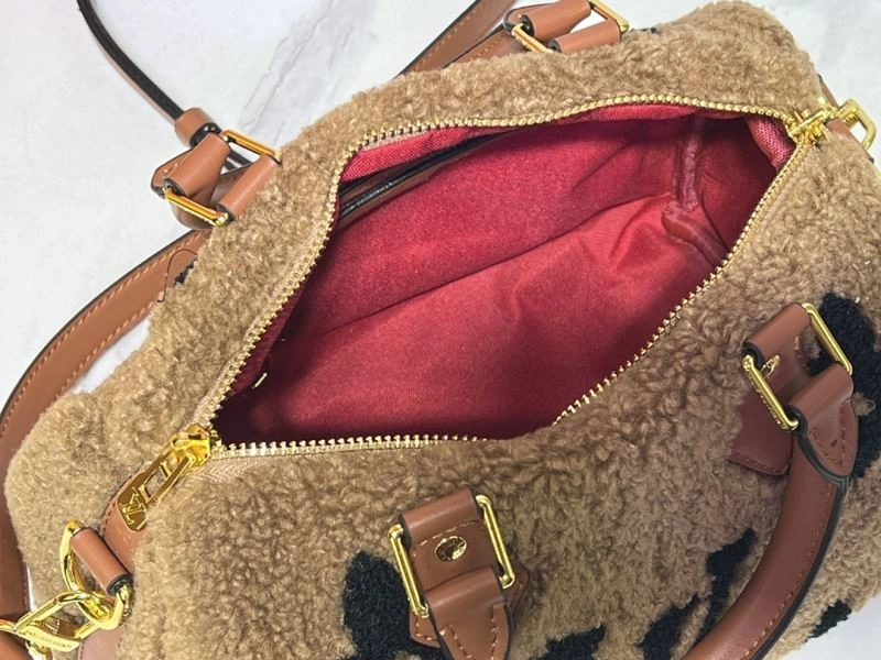 Brand-authenticated Louis Vuitton Speedy Bags