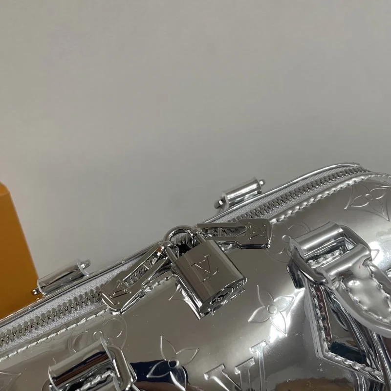 Brand-authenticated Louis Vuitton Speedy Bags
