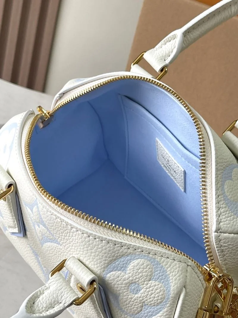 Brand-authenticated Louis Vuitton Speedy Bags