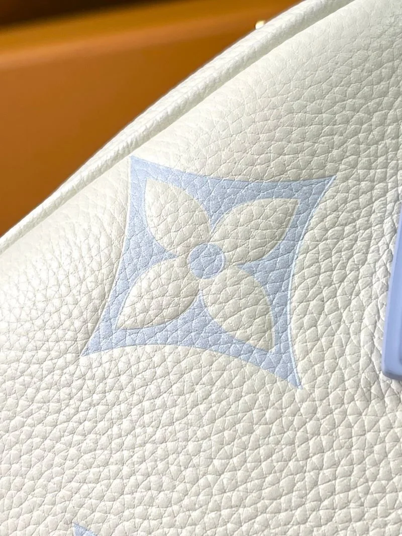 Brand-authenticated Louis Vuitton Speedy Bags