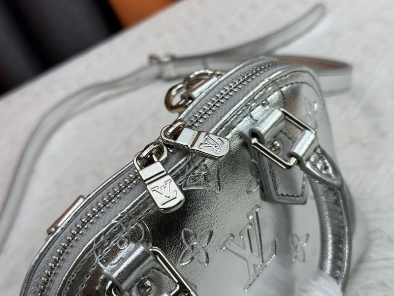 Brand-authenticated Louis Vuitton Top Handle Bags