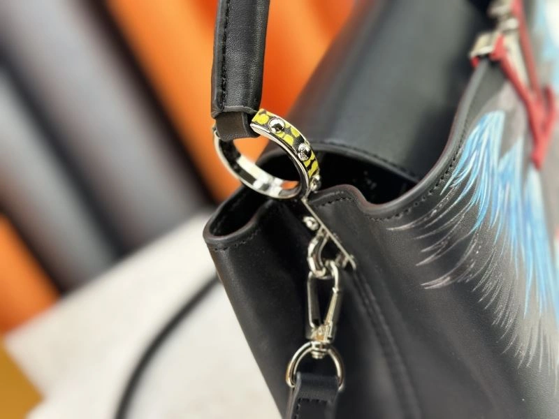 Brand-authenticated Louis Vuitton Top Handle Bags