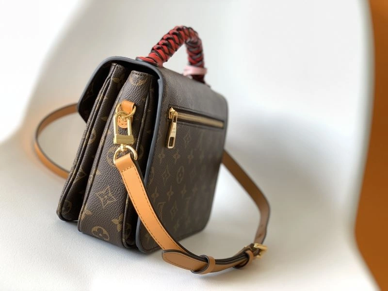 Brand-authenticated Louis Vuitton Top Handle Bags