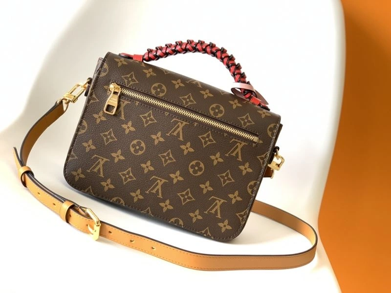 Brand-authenticated Louis Vuitton Top Handle Bags