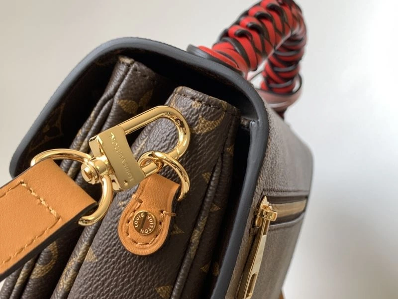 Brand-authenticated Louis Vuitton Top Handle Bags