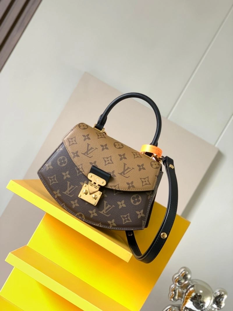 Value-priced Louis Vuitton Top Handle Bags