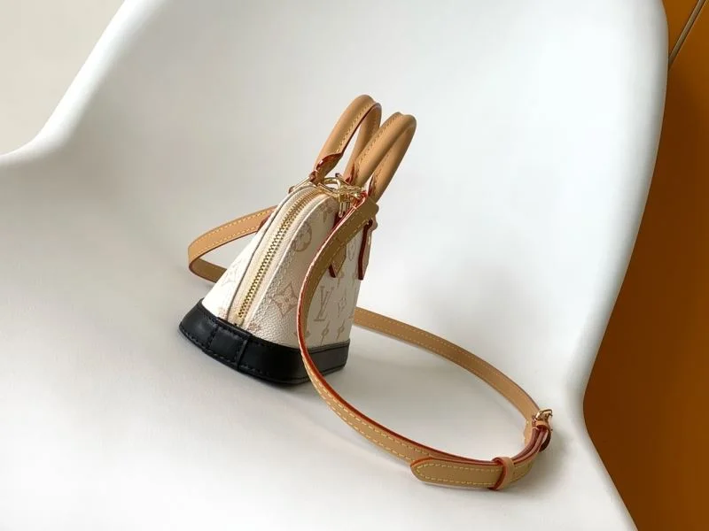 Brand-authenticated Louis Vuitton Top Handle Bags