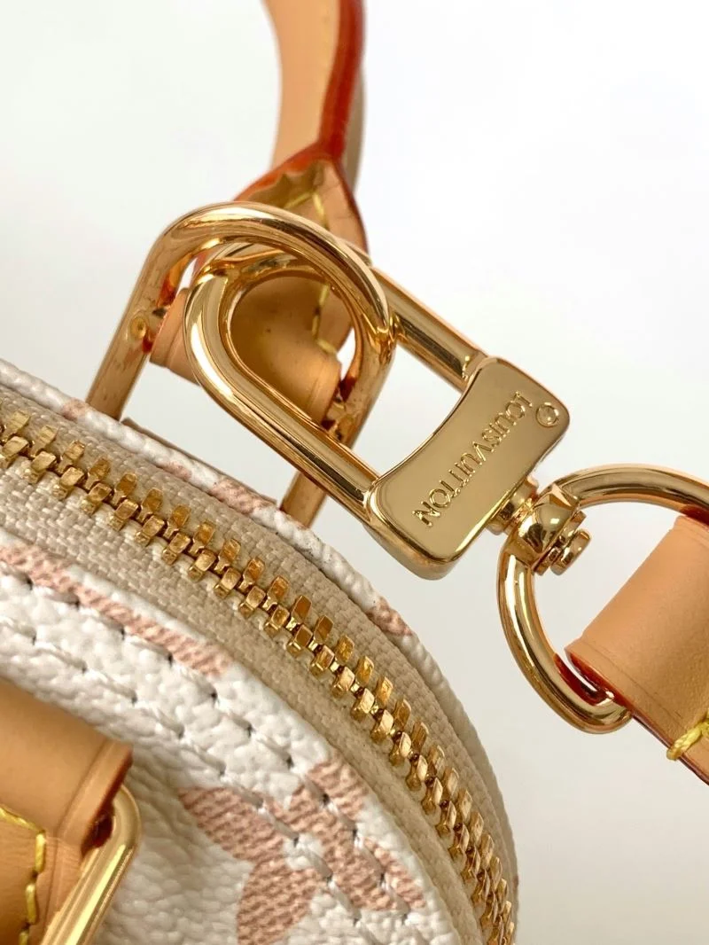 Brand-authenticated Louis Vuitton Top Handle Bags