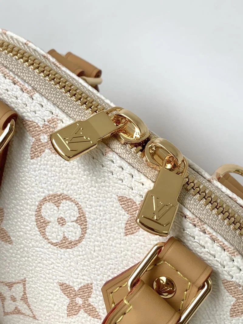 Brand-authenticated Louis Vuitton Top Handle Bags