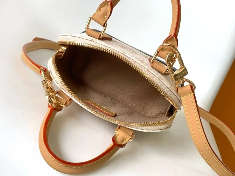 Brand-authenticated Louis Vuitton Top Handle Bags