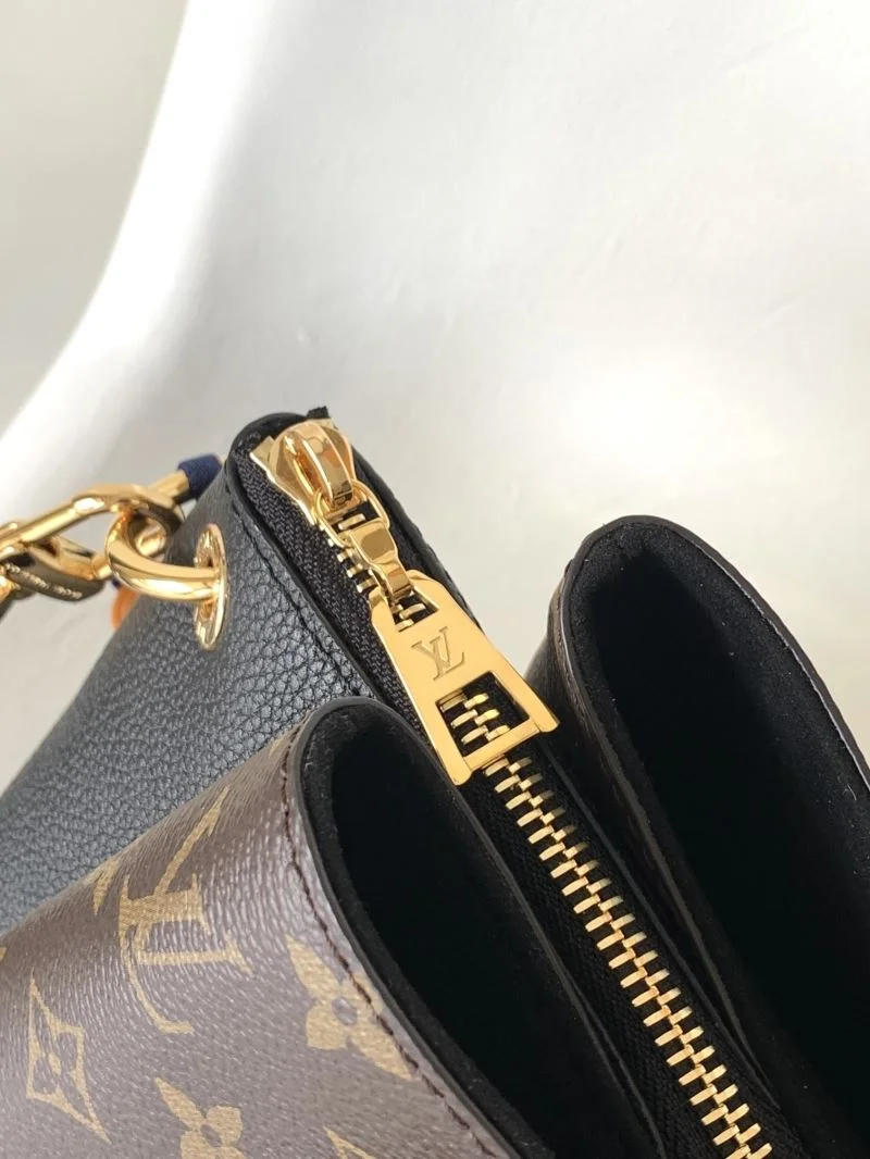 Brand-authenticated Louis Vuitton Top Handle Bags