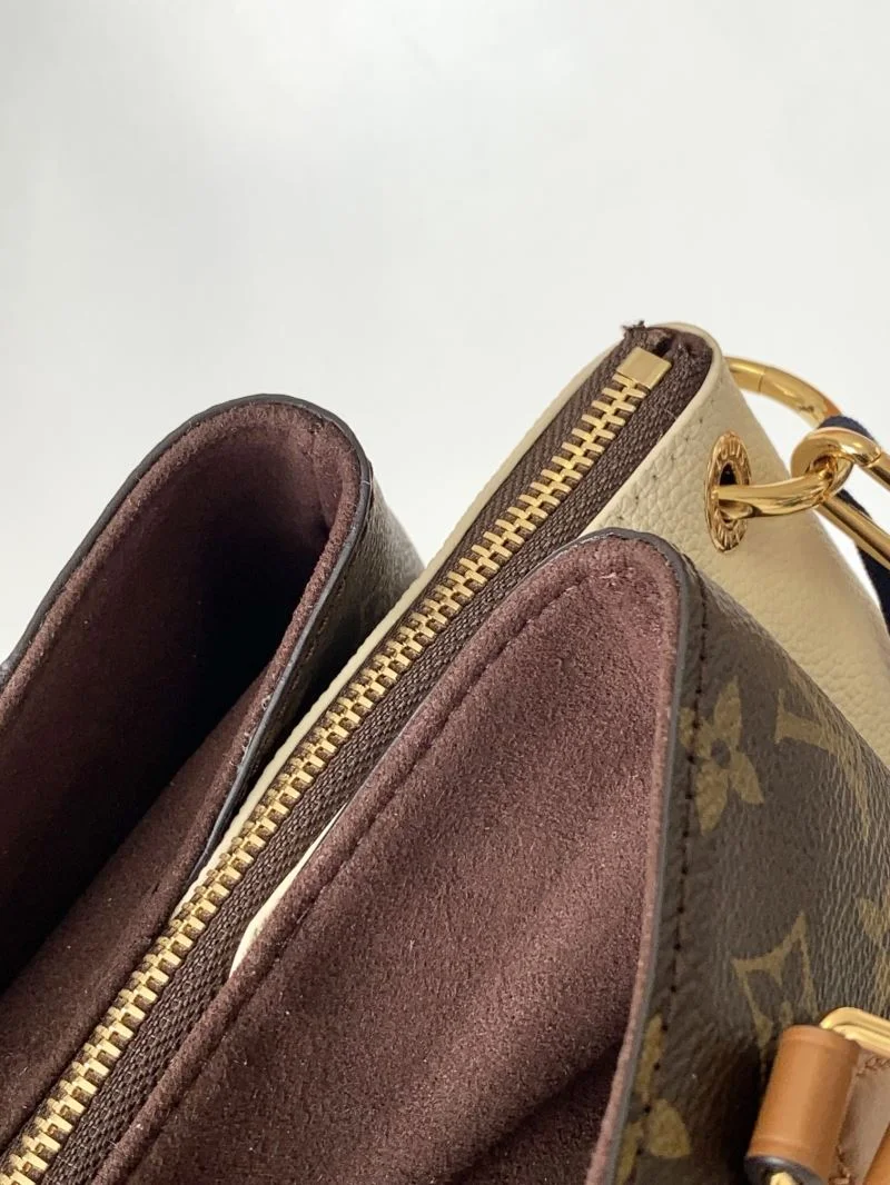 Exact replica Louis Vuitton Top Handle Bags