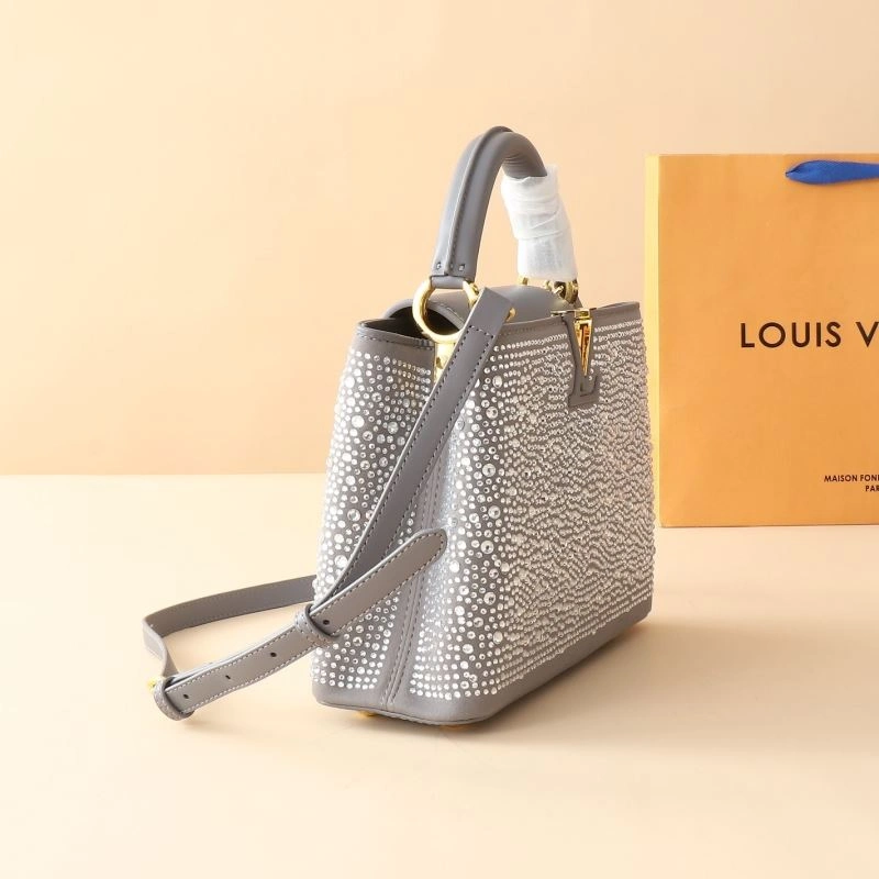 Brand-authenticated Louis Vuitton Top Handle Bags
