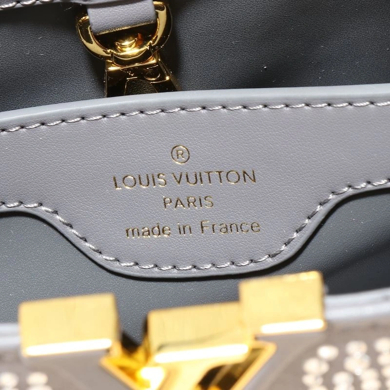 Brand-authenticated Louis Vuitton Top Handle Bags