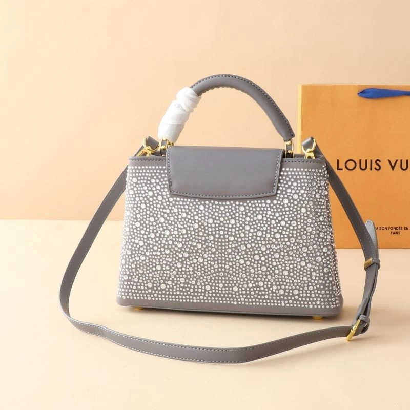 Brand-authenticated Louis Vuitton Top Handle Bags