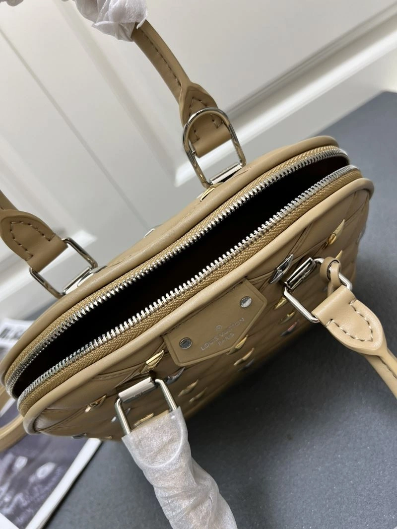 Brand-authenticated Louis Vuitton Top Handle Bags