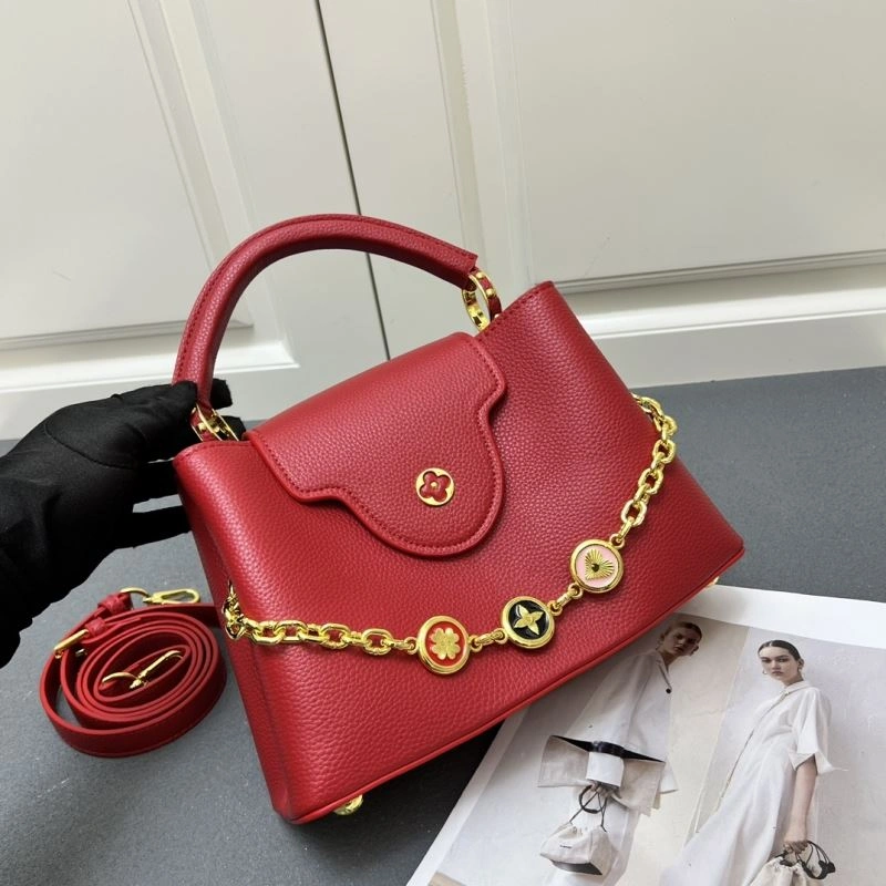 Brand-authenticated Louis Vuitton Top Handle Bags