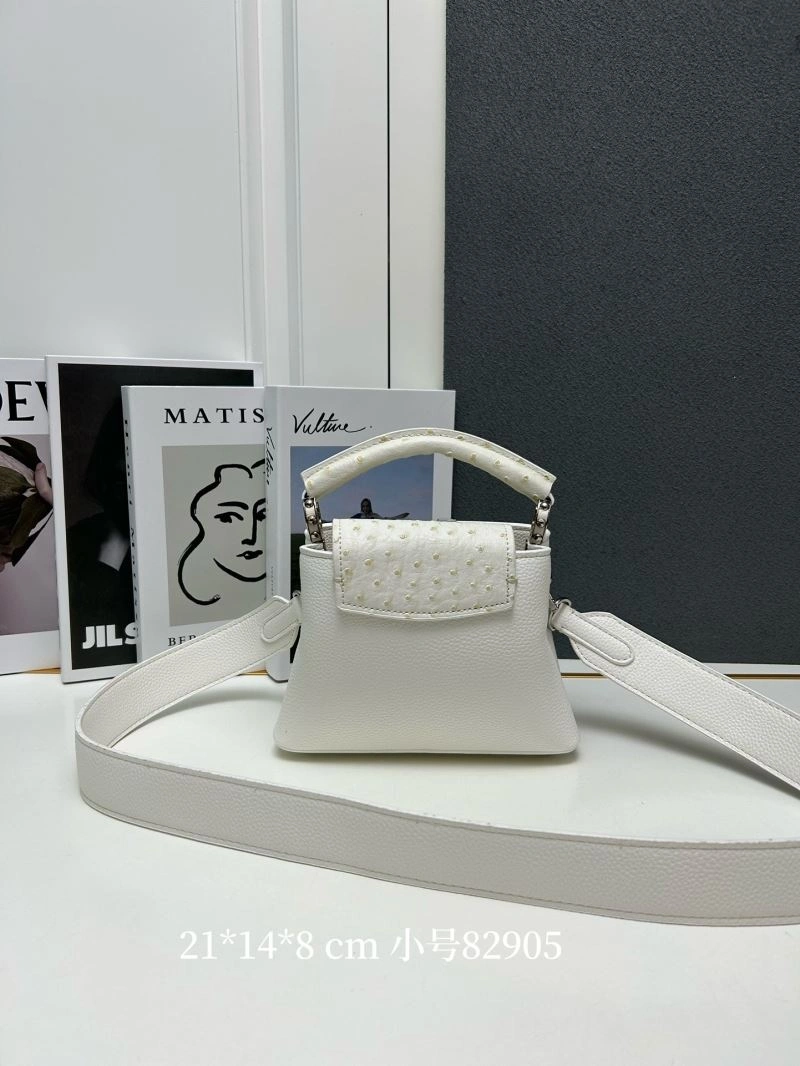 Indistinguishable Louis Vuitton Top Handle Bags