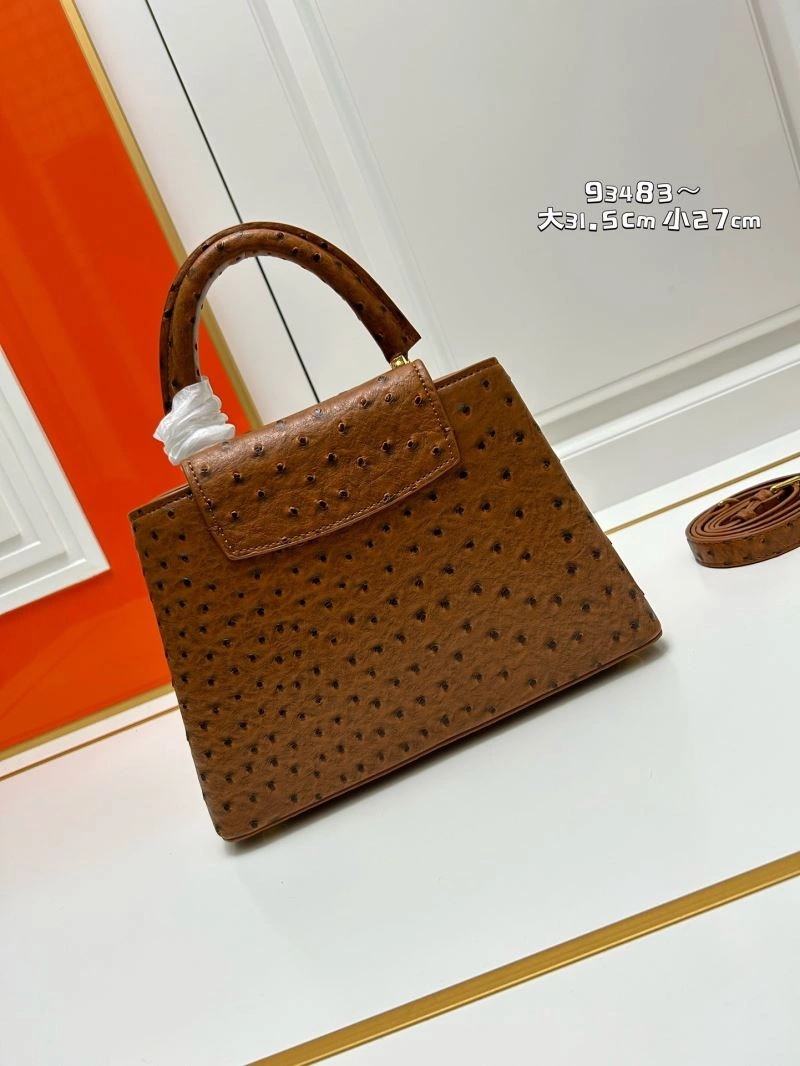 Brand-authenticated Louis Vuitton Top Handle Bags