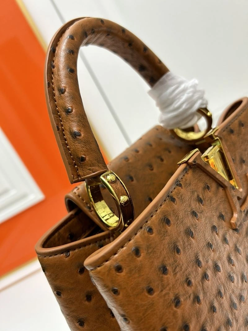 Brand-authenticated Louis Vuitton Top Handle Bags